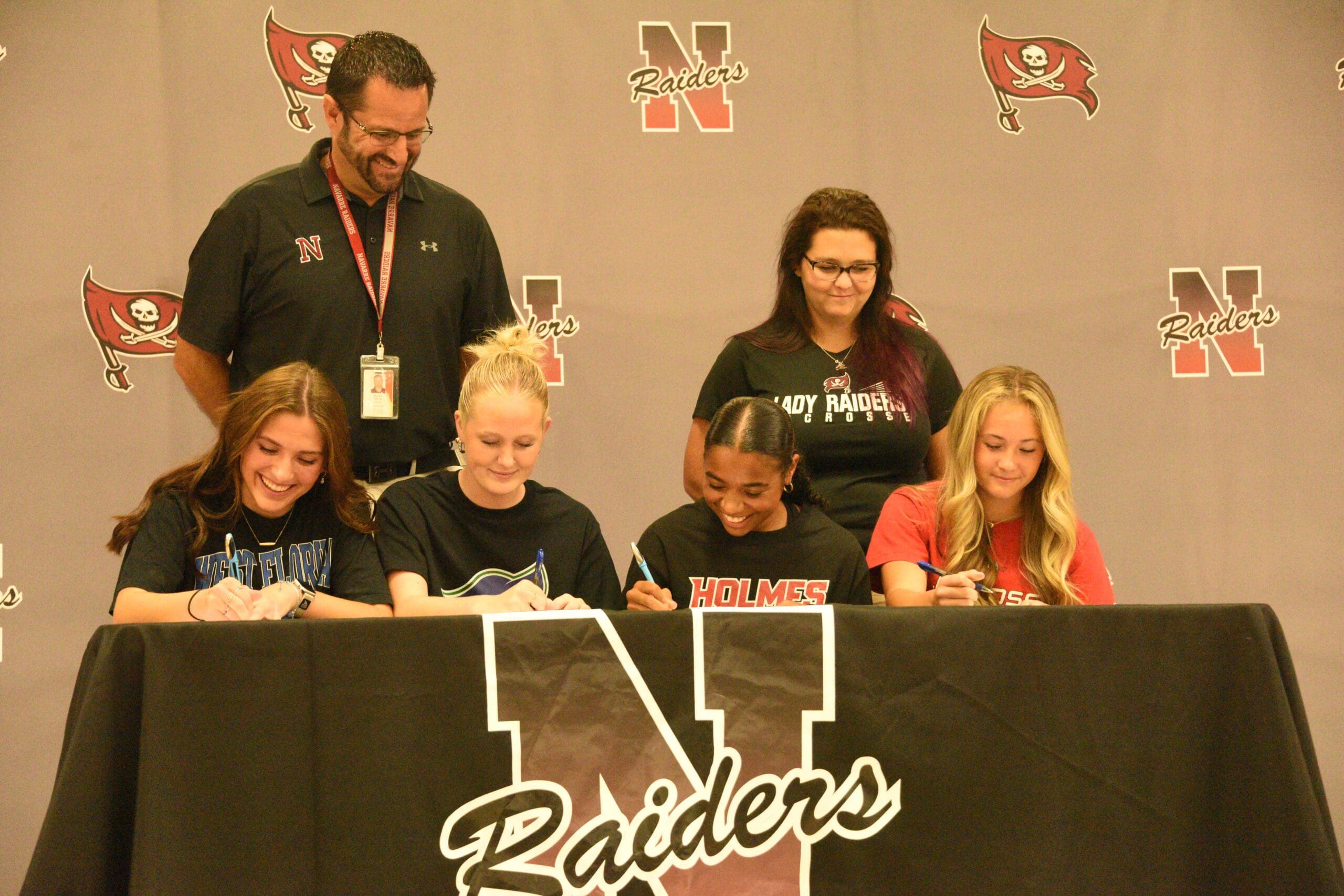Four Raider athletes put pen to paper in early signing period | Navarre ...