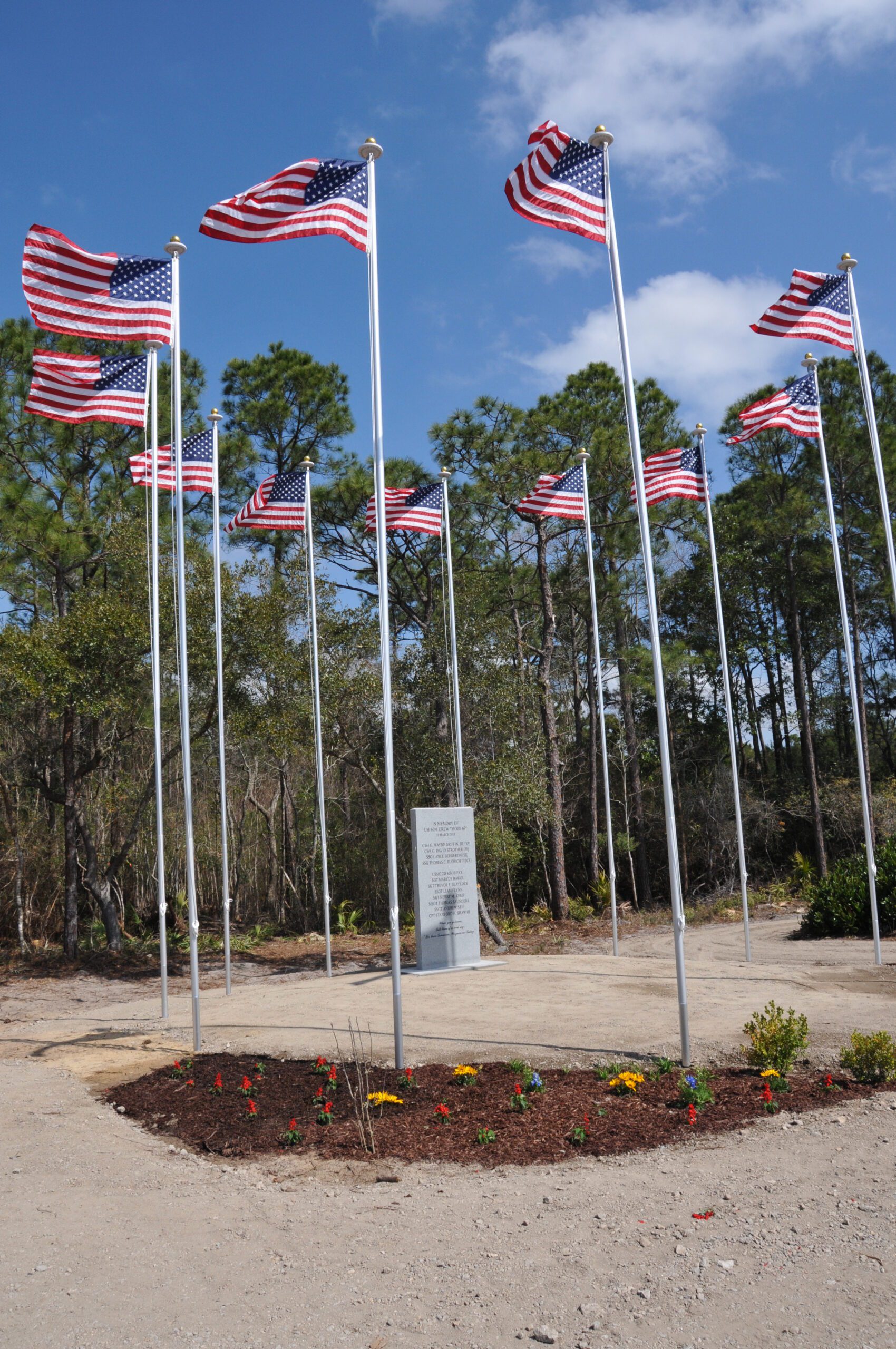 11 flags memorialize the fallen | Navarre Press